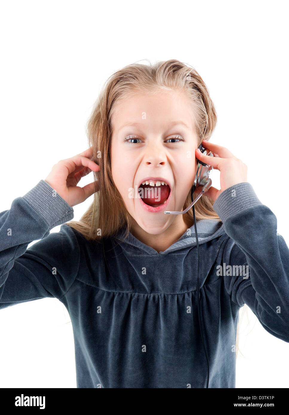 shocked little girl with headset. White background Stock Photo - Alamy