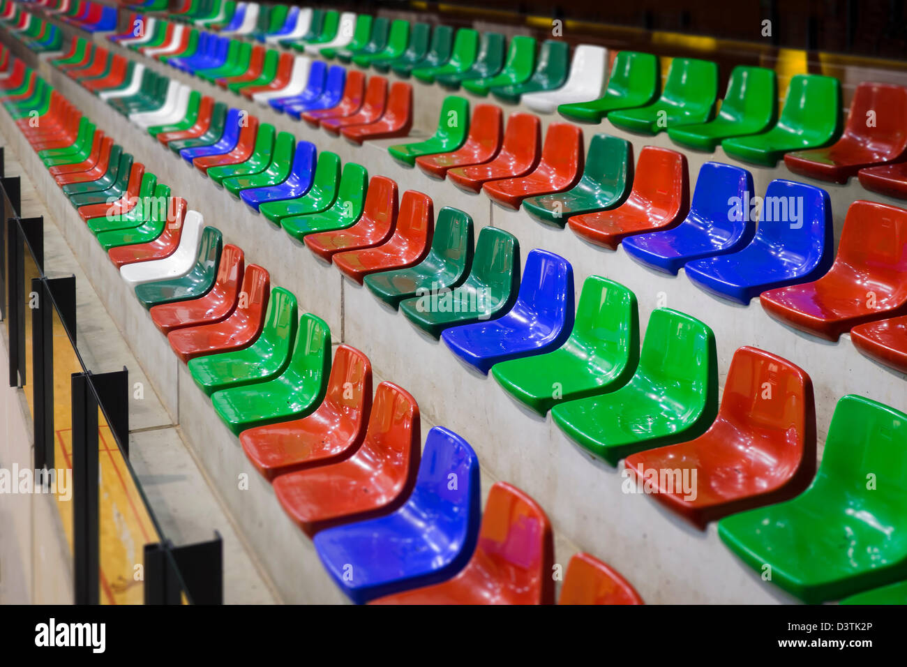 Row of colorful empty seats in hall Stock Photo - Alamy