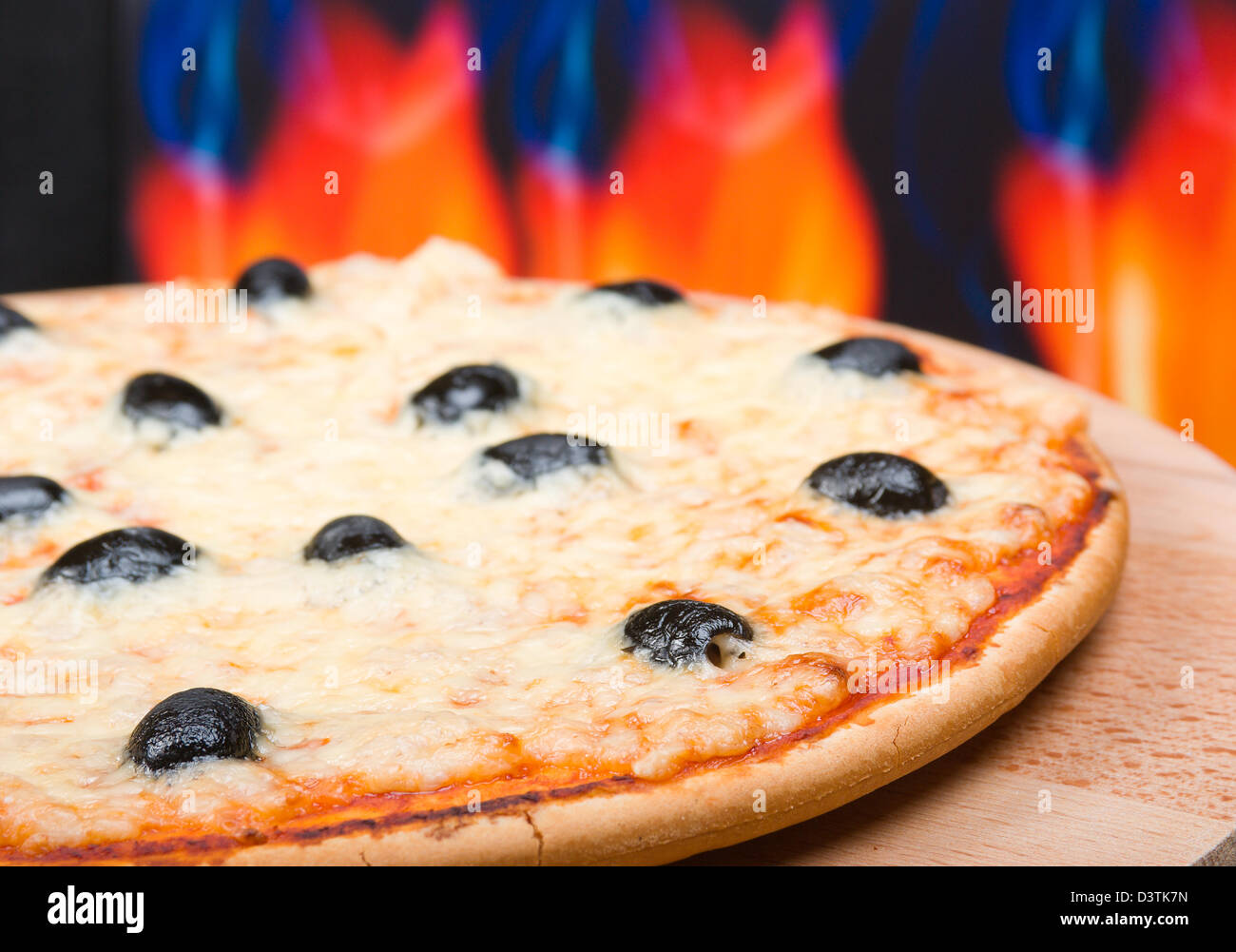 Pizza with fire on background.italian kitchen Stock Photo - Alamy