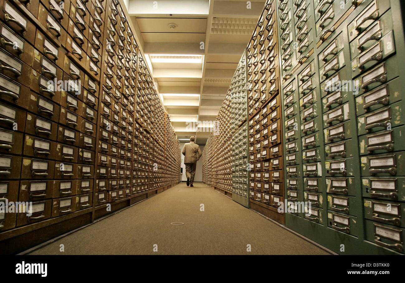 The picture shows card-index cabinets with labelled drawers at the ...