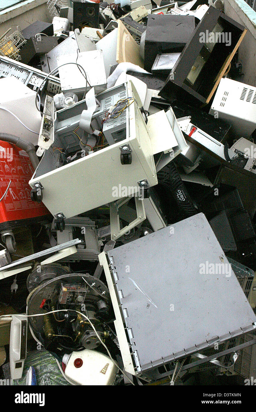 The picture shows old computers and other electronic waste in a ...