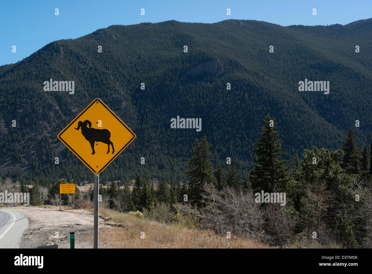 Traffic sign warning for bighorn sheep Stock Photo - Alamy