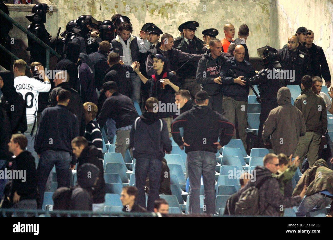 German hooligans fight with the police during the European Championship ...
