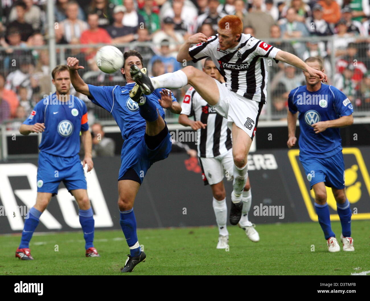 Bernd Thijs of Moenchengladbach (R) and Wolfsburg's Jonathan Santana ...