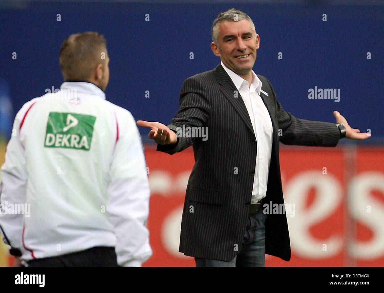 Schalke's head coach Mirko Slomka makes a gesture during the Bundesliga ...