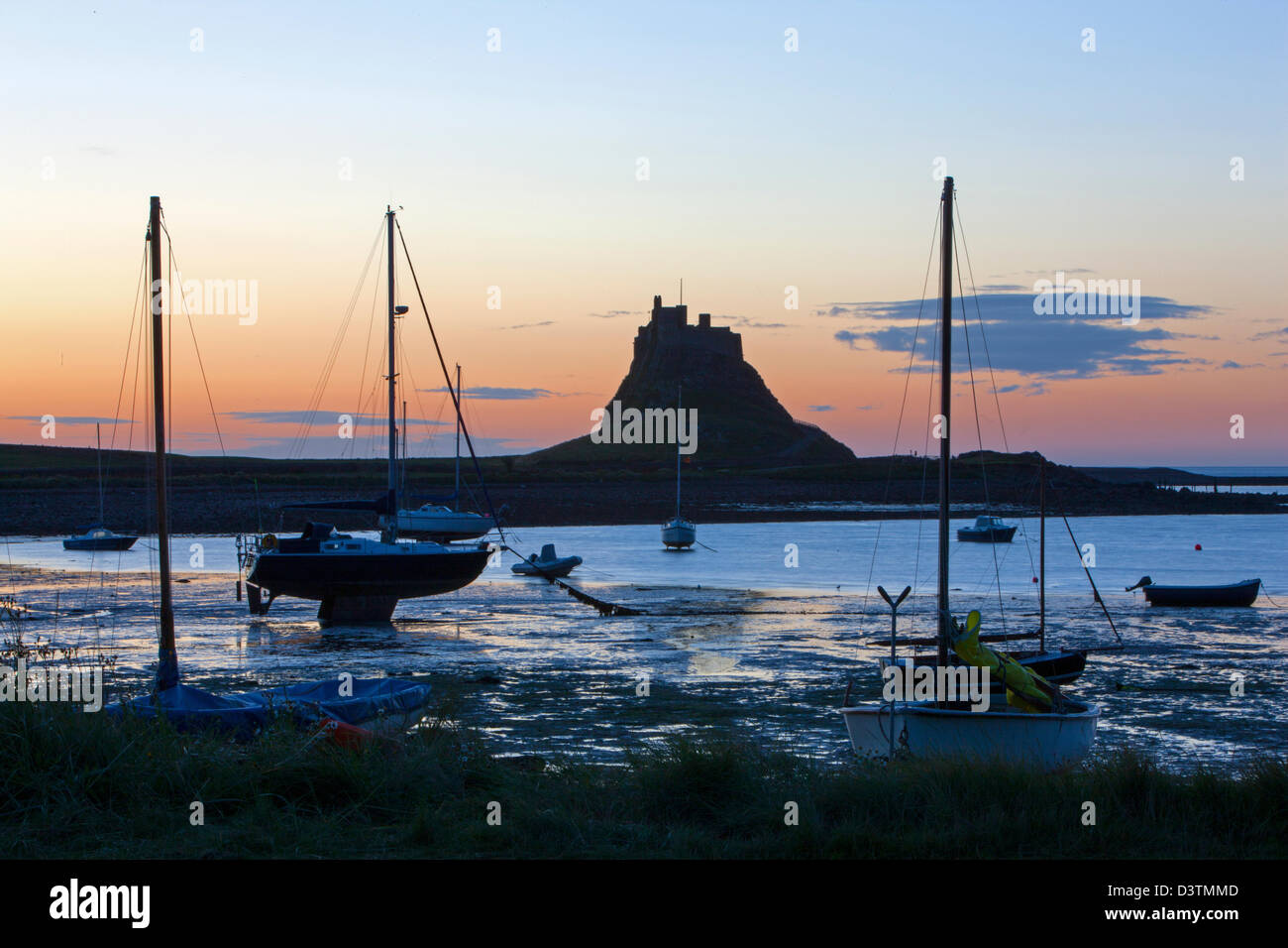 Fishing boats holy island beach hi-res stock photography and images - Alamy