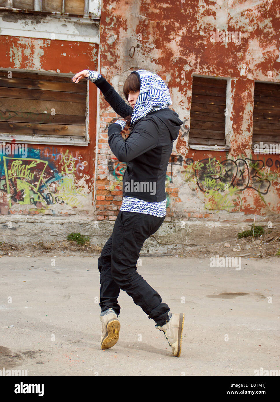 Hip hop female performing and act over an urban background Stock Photo ...