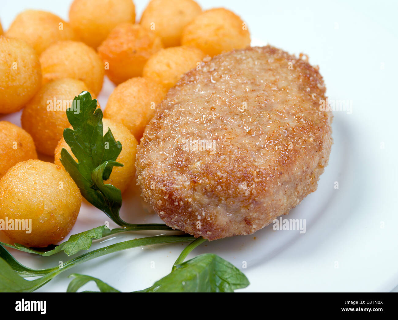 chops with potatoes on plate Stock Photo - Alamy