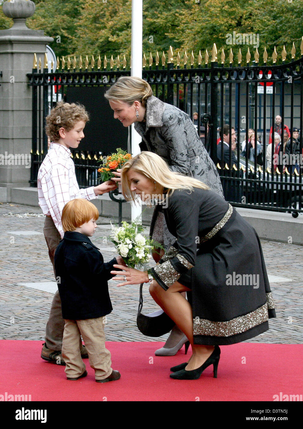 Children greet Crown Princess Mathilda of Belgium (back) and Crown ...