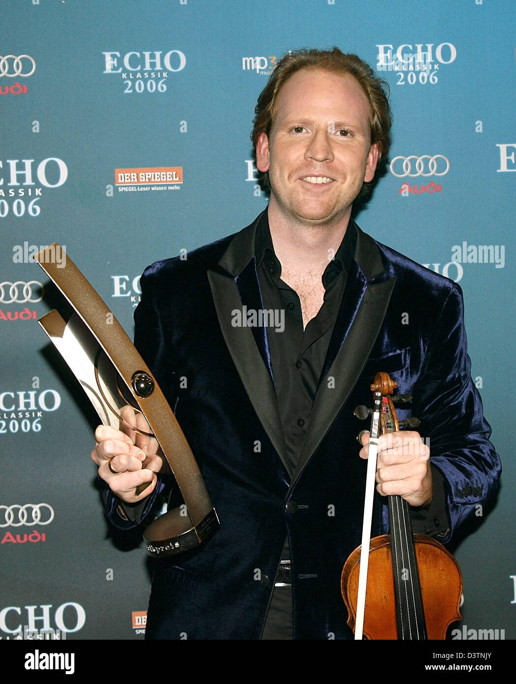 British violinist Daniel Hope presents his award at the ceremony for ...