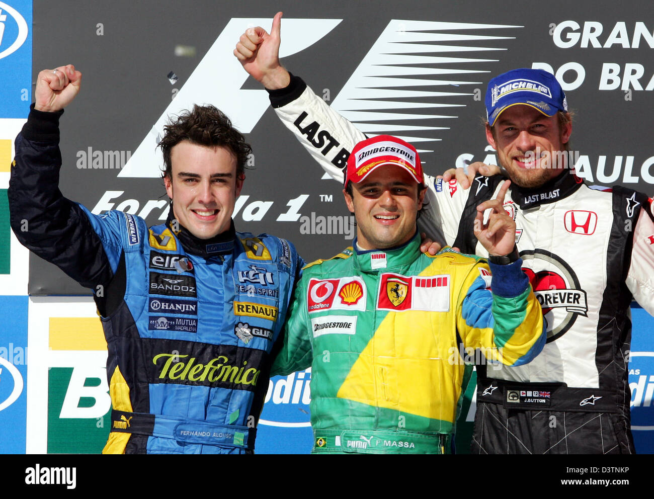 Brazilian Formula One driver Felipe Massa (C) of Scuderia Ferrari F1 ...