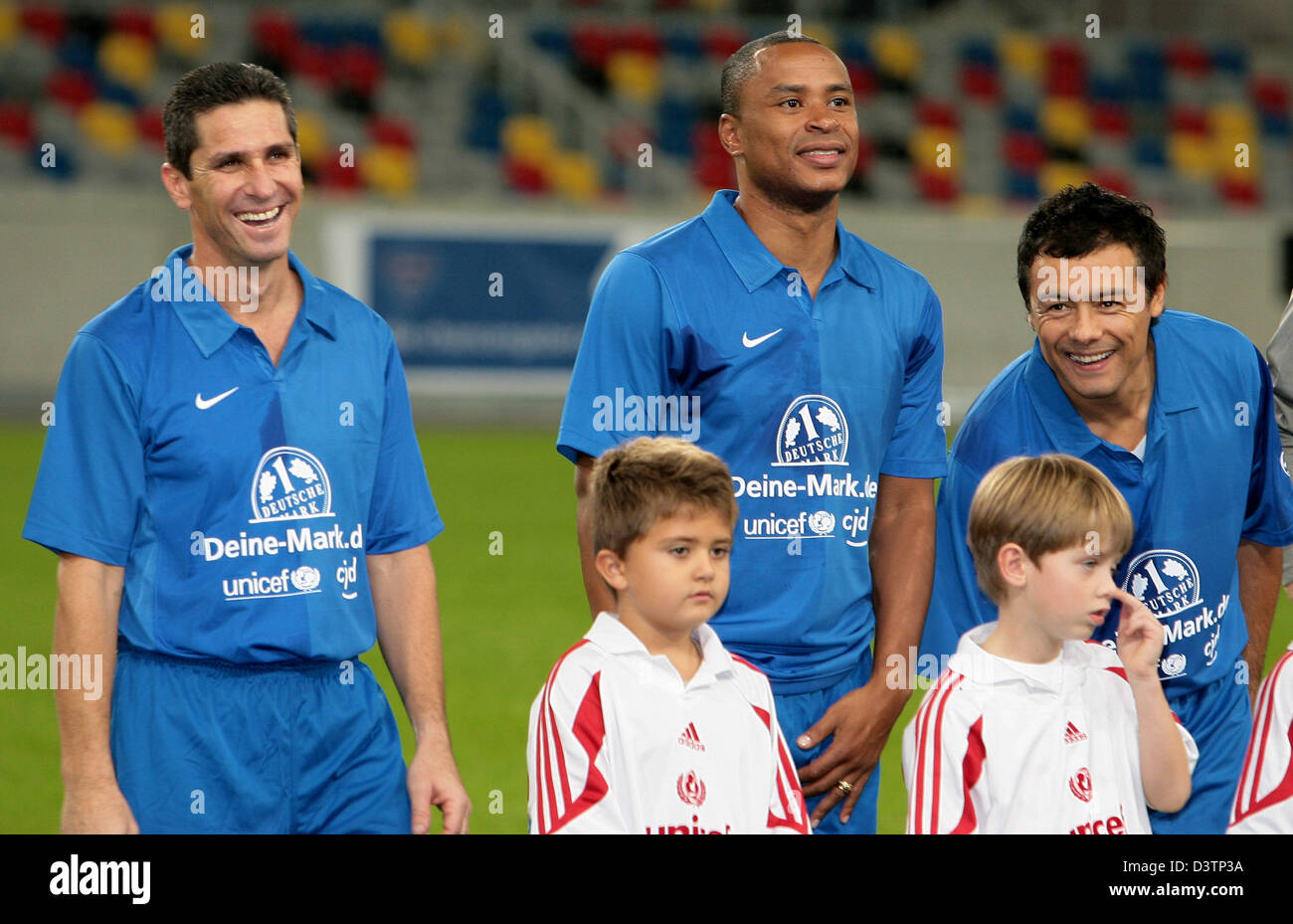 Players of team international, Brazilian Jorginho (L-R), Paulo Sergio ...