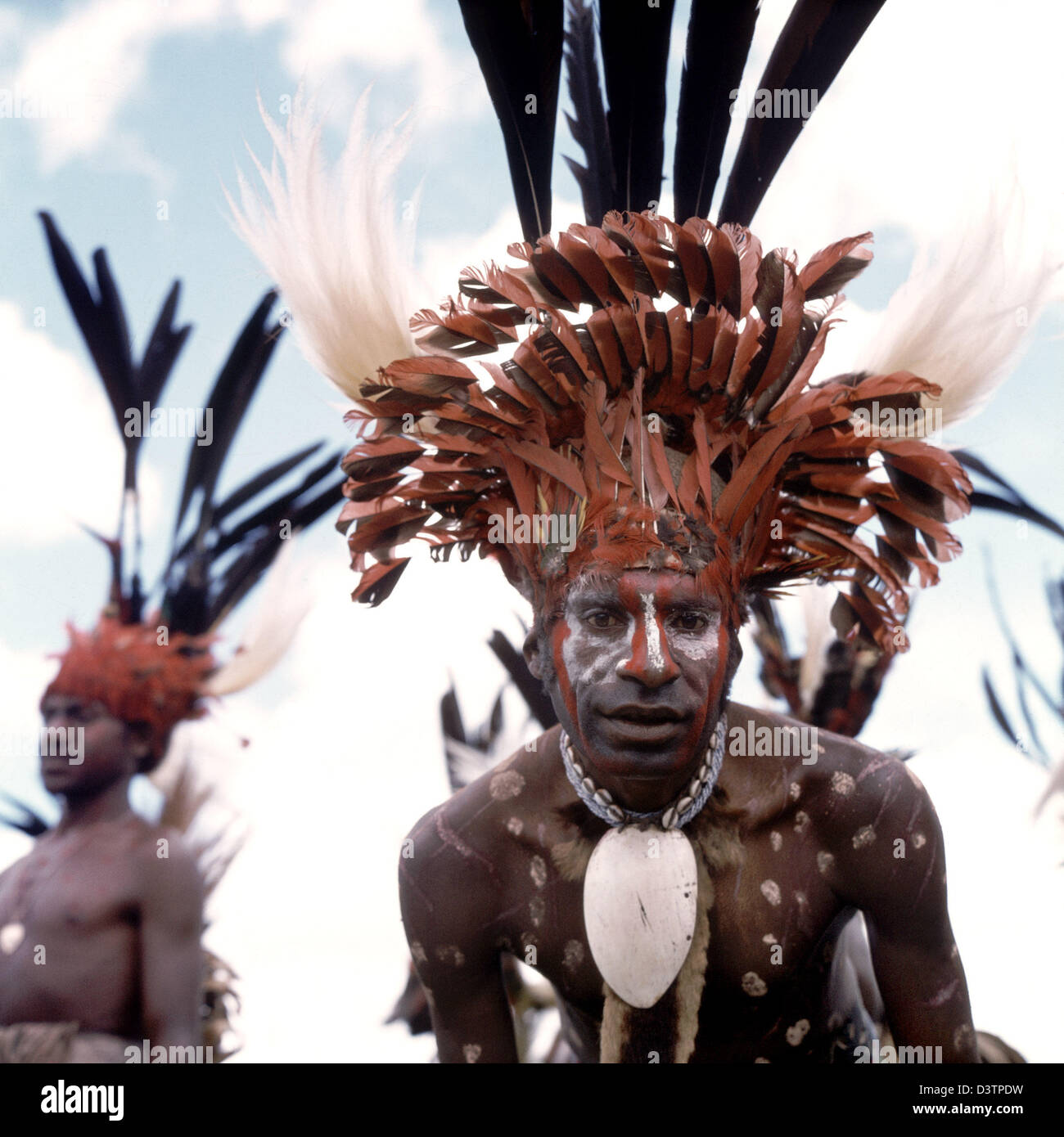 The undated picture shows highland Papuas with glorious feather ...