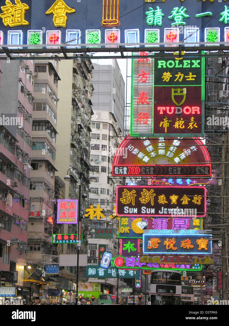 Numerous luminous advertising signs dominate the quarter Kowloon of ...