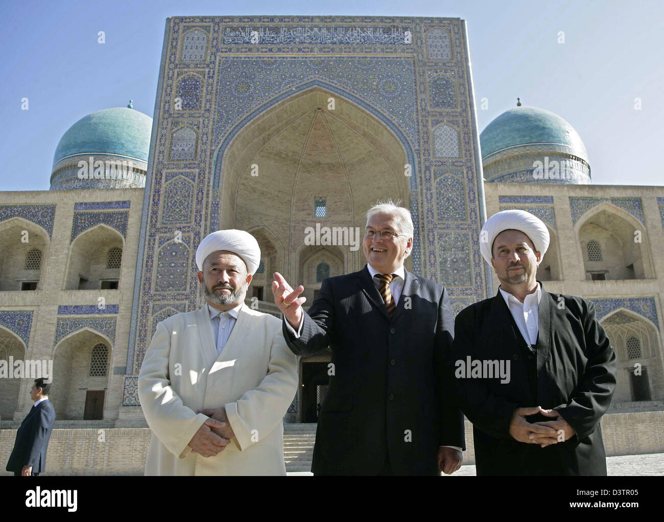 German Foreign Minister Frank-Walter Steinmeier poses next to Muslim ...
