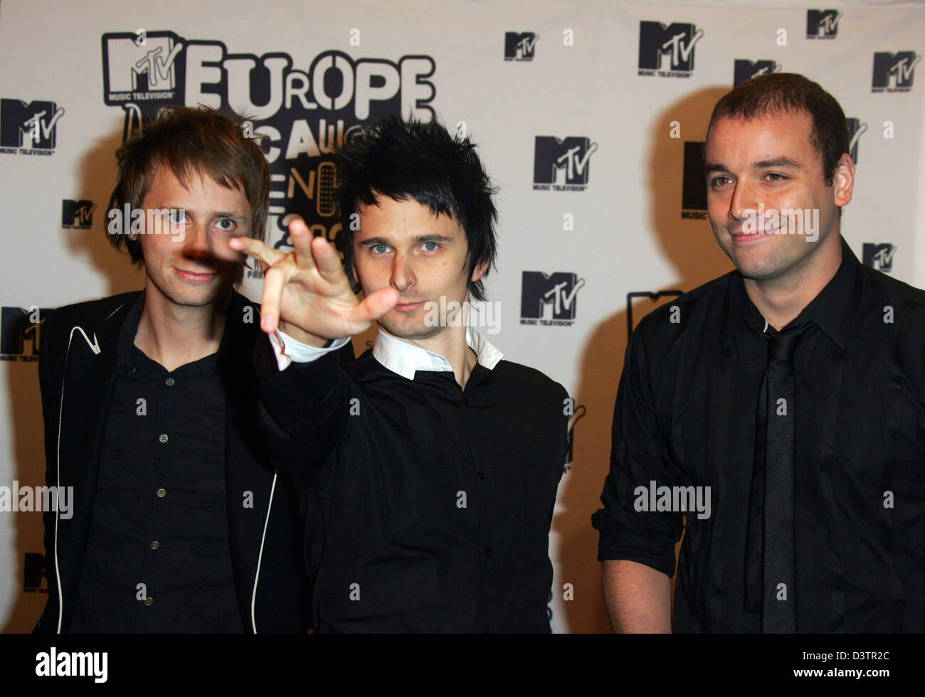 Members of the British rock band 'Muse' pose on the red carpet at Bella ...