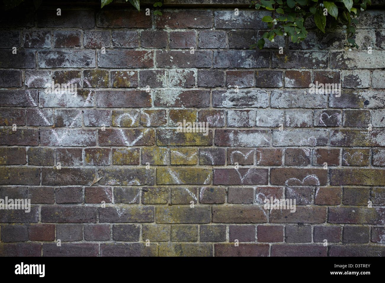 love hearts on brickwall Stock Photo - Alamy