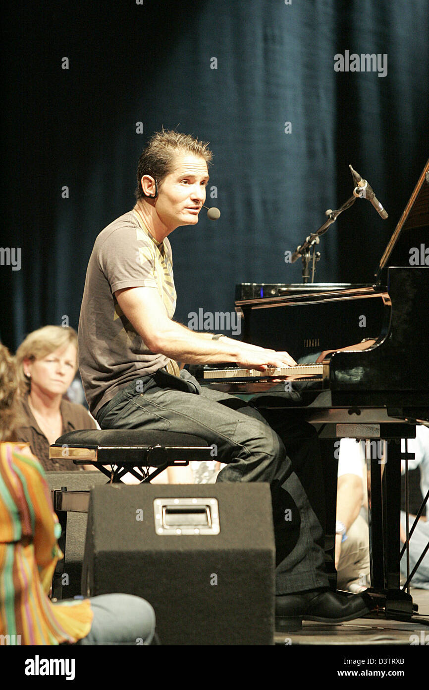 Joshua Kadison shown on stage at the Muffathalle' concert hall in ...