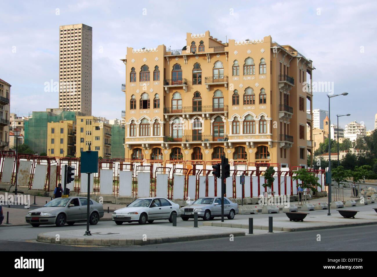 The picture shows a street scene with modern buildings in the capital ...