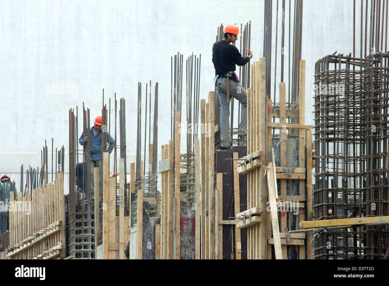 Workers are pictured at a construction site in the capital Beirut ...
