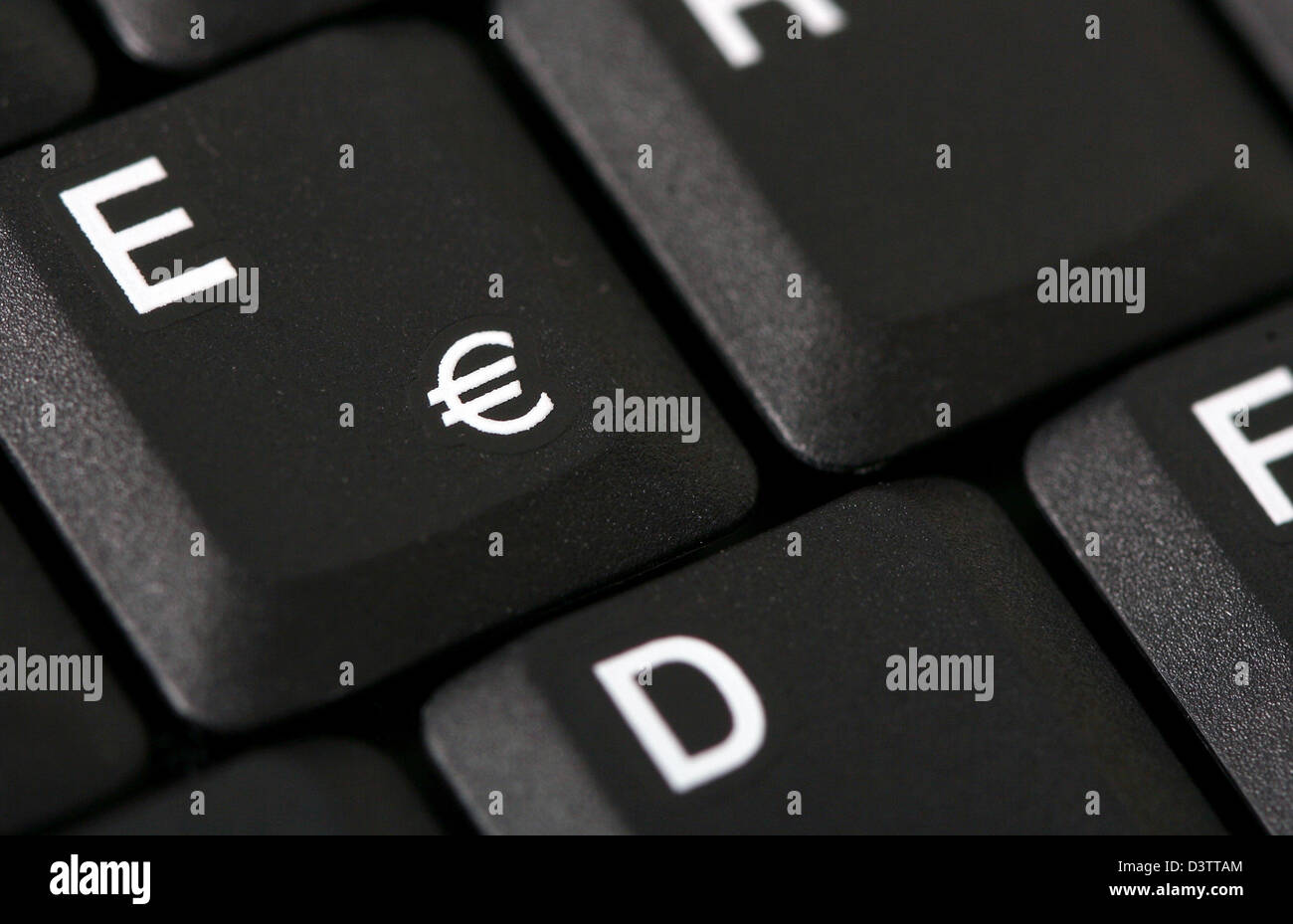 The euro sign photographed on a keyboard in Bonn, Germany, Monday 06 ...