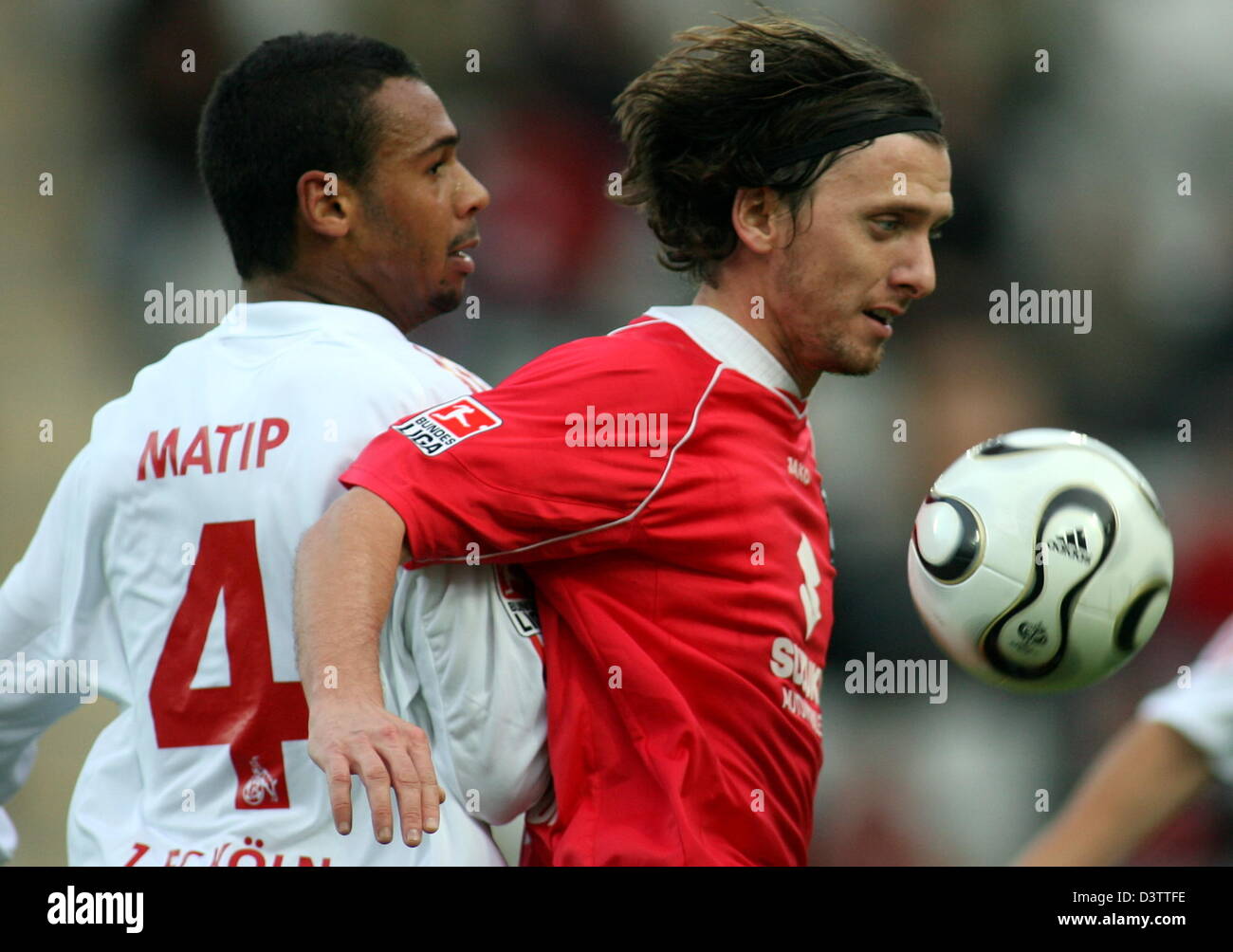 SC Freiburg's Henrich Bencik (R) and Cologne's Marvin Matip shown in ...