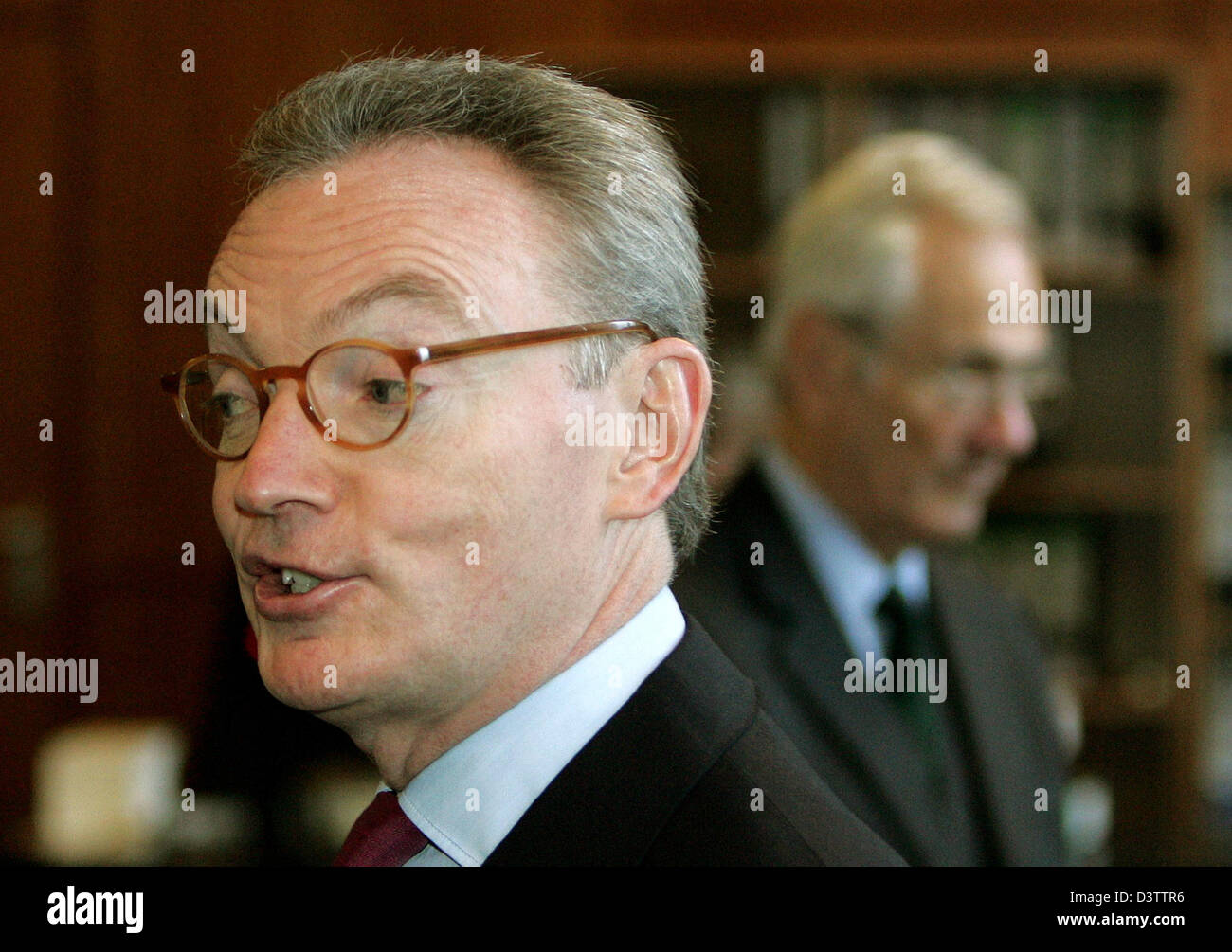 Former Mannesmann AG CEO Klaus Esser (L) is pictured during the fourth ...