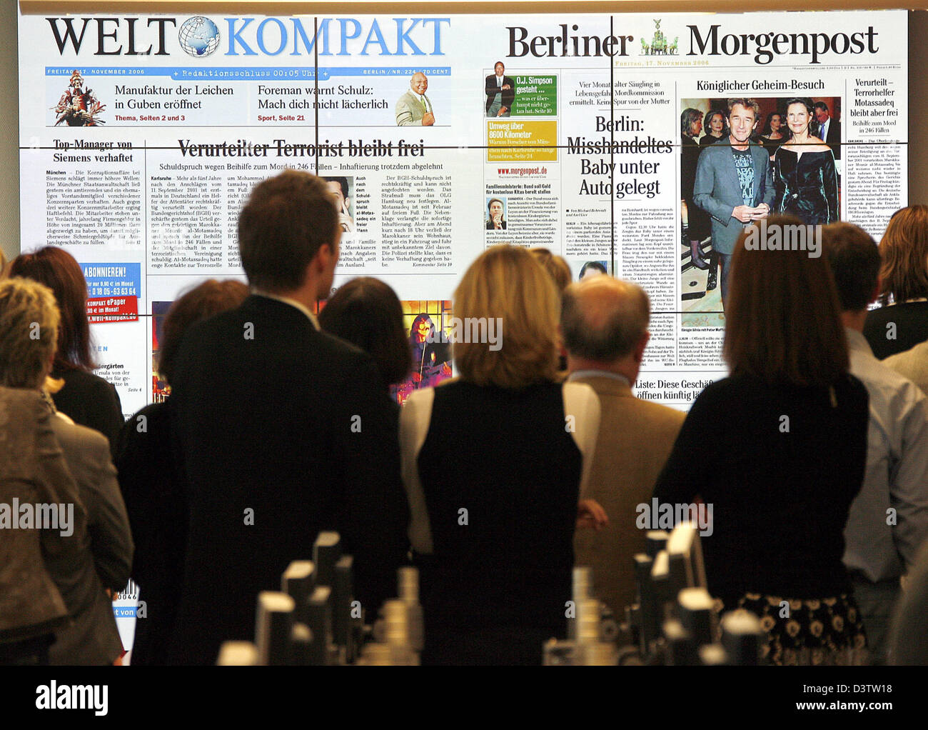 Newspaper group hi-res stock photography and images - Alamy