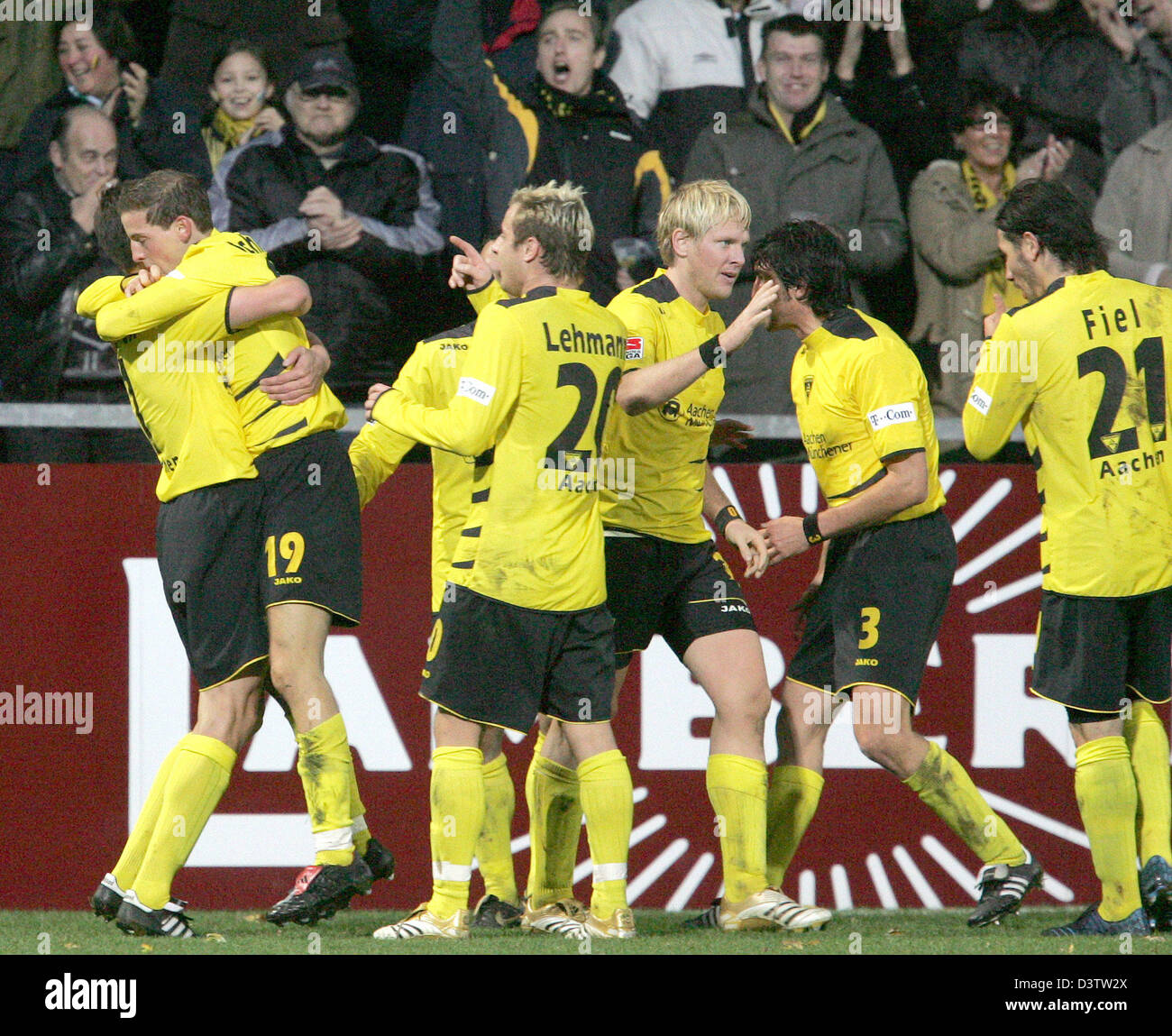 Aachen players celebrate with Jan Schlaudraff (2nd L), who scored the 2 ...