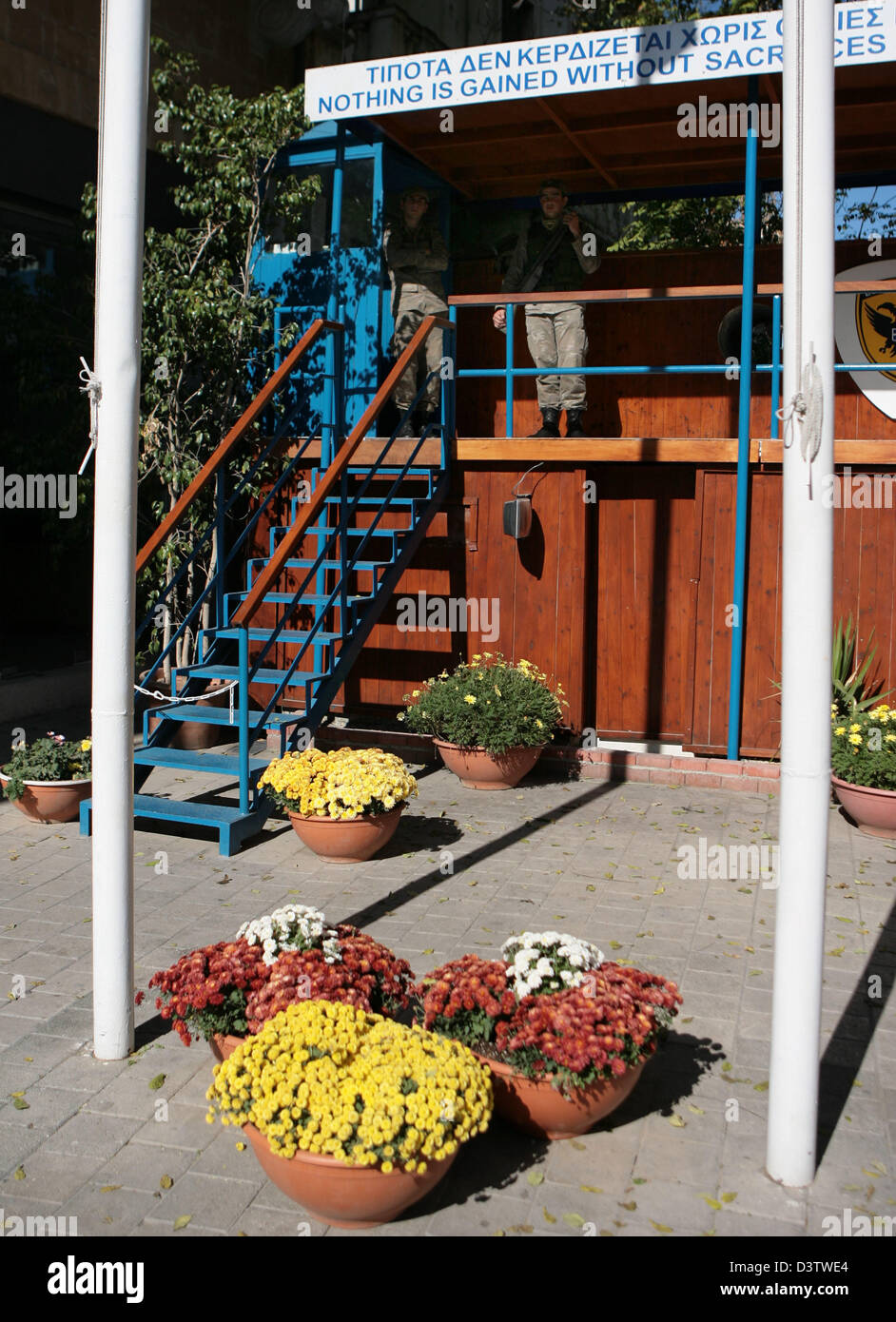 Greek border control officers guard the border between the Greek and ...