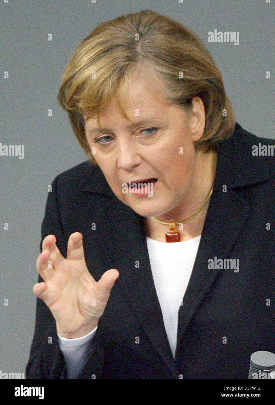 German Chancellor Angela Merkel (CDU) makes a gesture during her speech ...