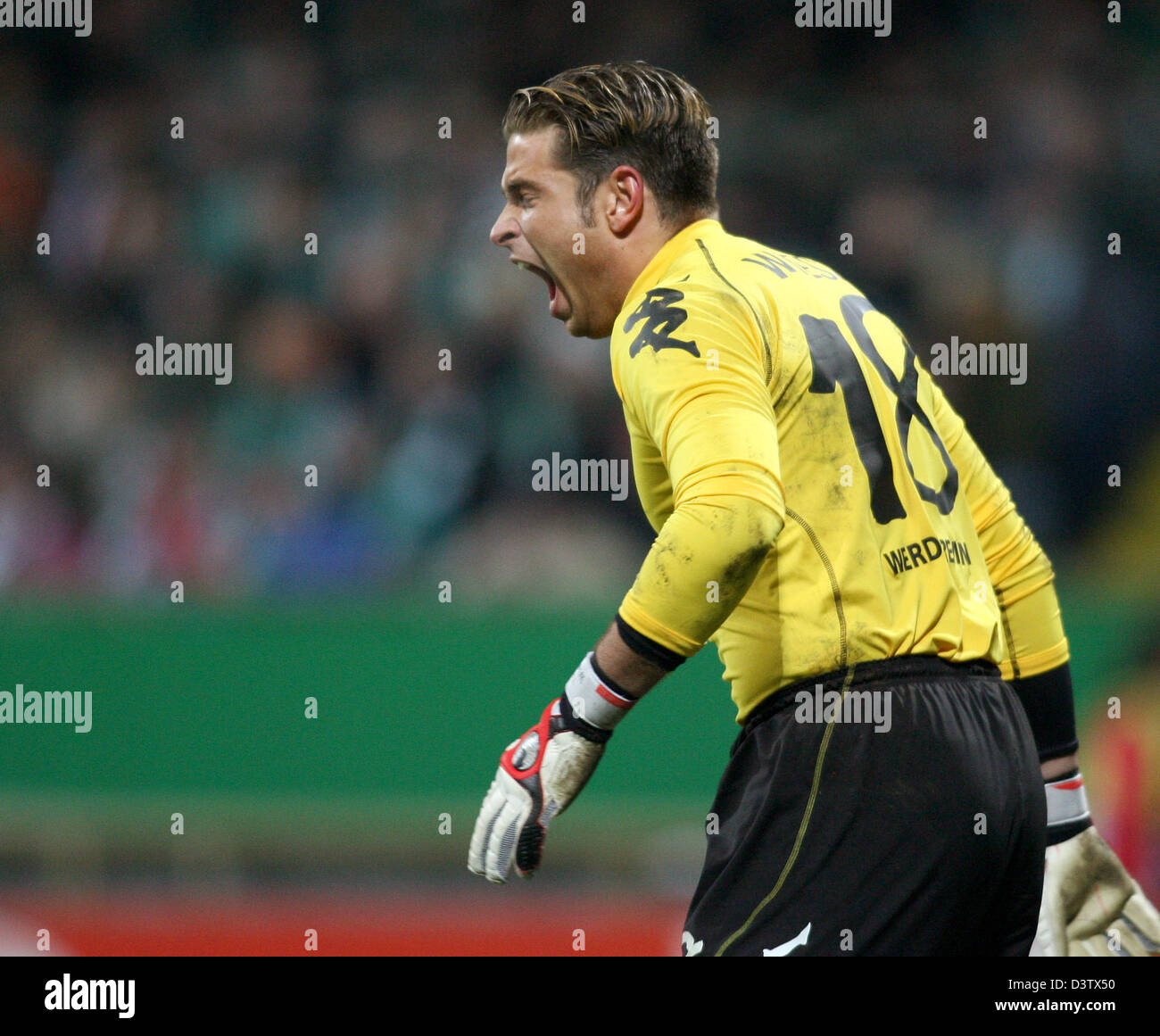 Bremen goalie Tim Wiese screams to his defence during the UEFA ...