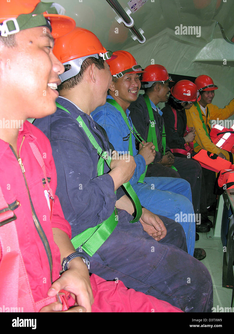 The photo shows crew members inside a modern rescue boat during an ...