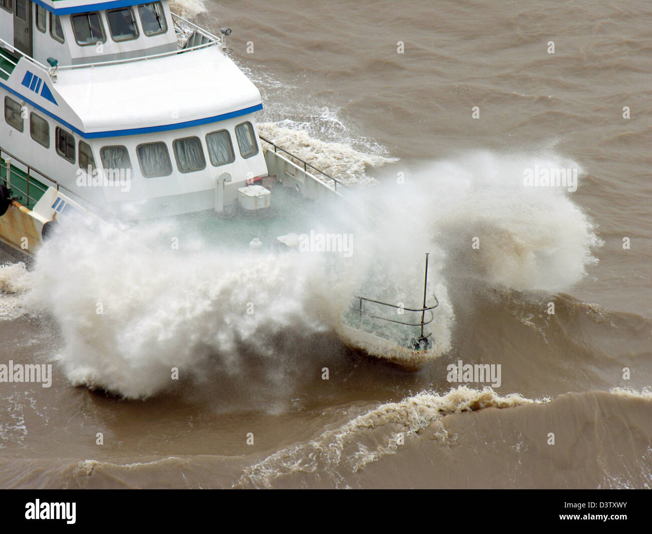 A boat shown in heavy sea photographed from the container ship LT ...