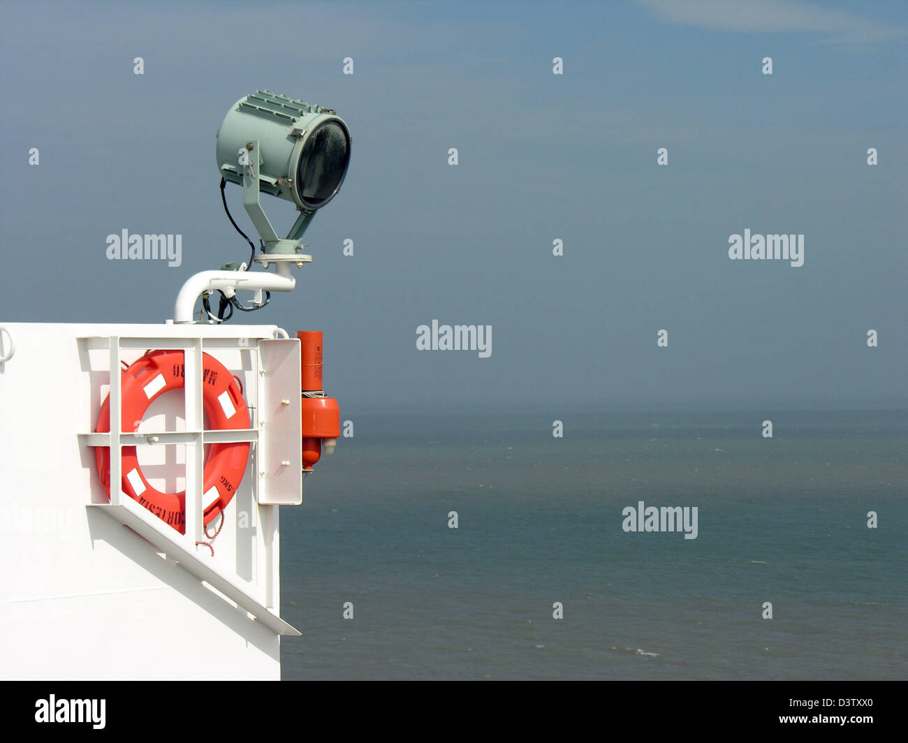 The photo shows a searchlight, a lifebelt and a GPS locating device ...