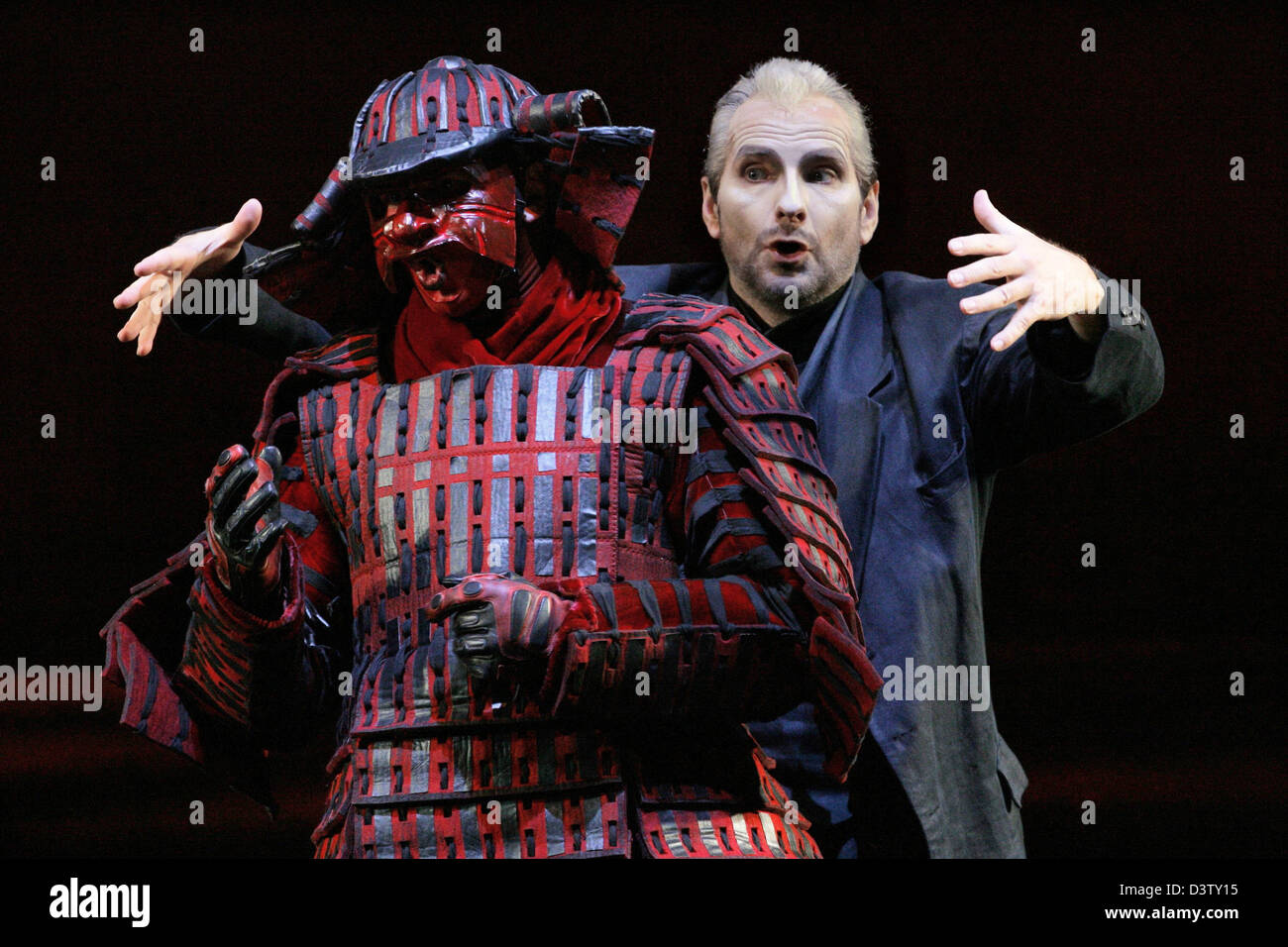 Actors Juergen Mueller as Mephistopheles (R) and Mirko Janiska as a ...