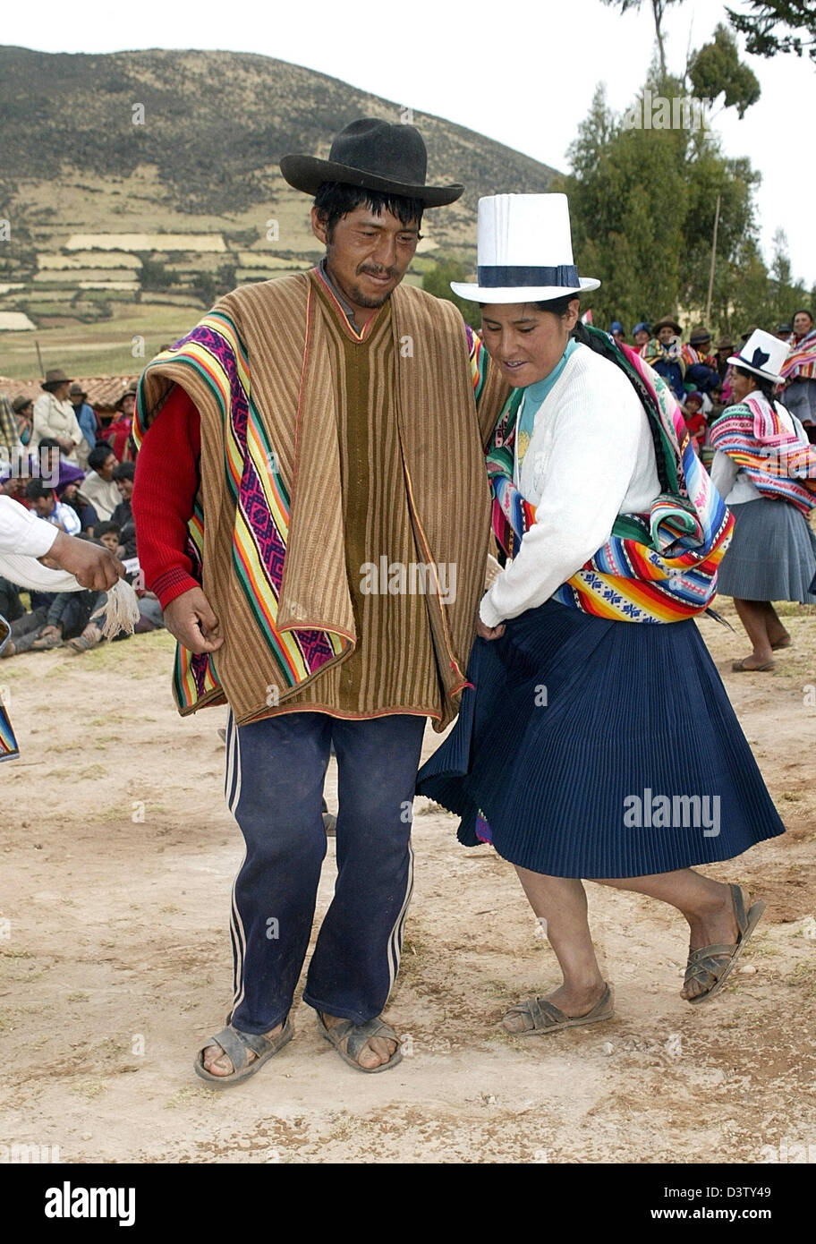 (dpa file) - A Peruvian couple dances in traditional costumes at a ...