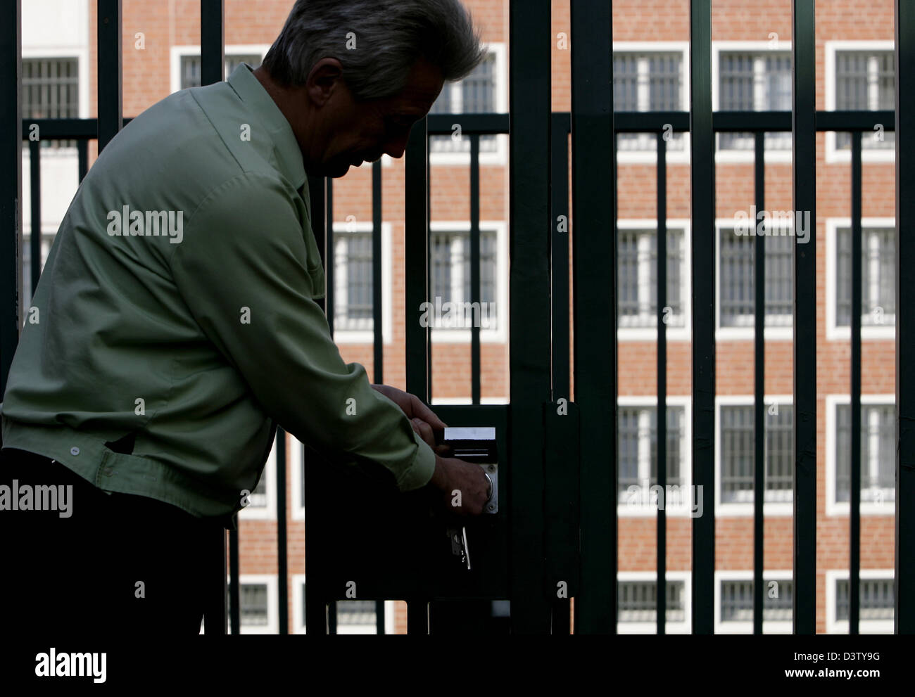 A prison officer locks the correctional facility (JVA) of Aachen ...