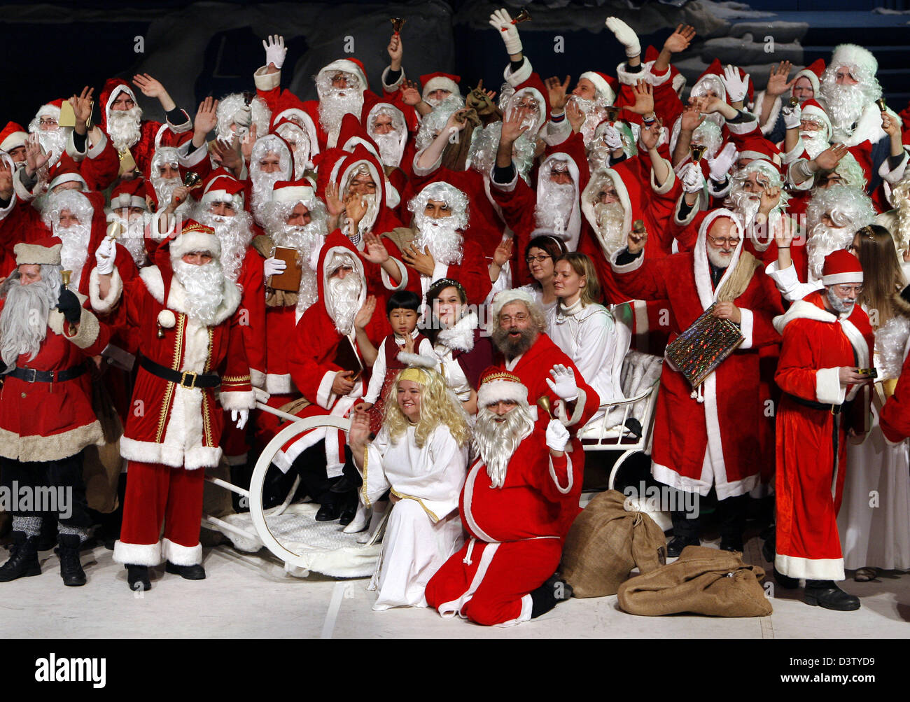 More than hundred Santas wave from the stage of the Friedrichstadt ...