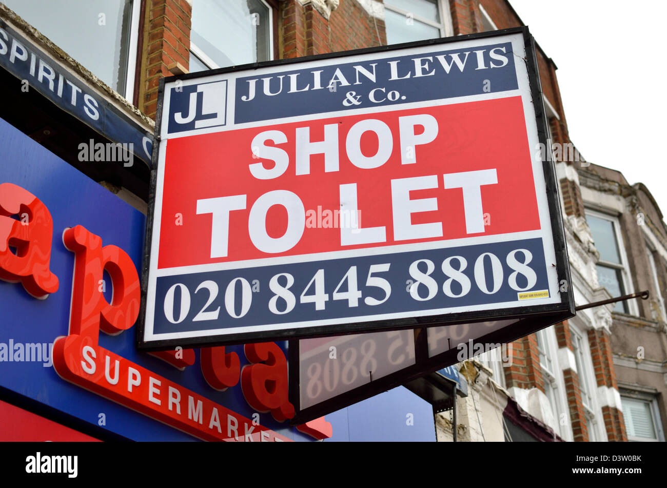 Shop To Let sign above a shop, London, UK Stock Photo - Alamy