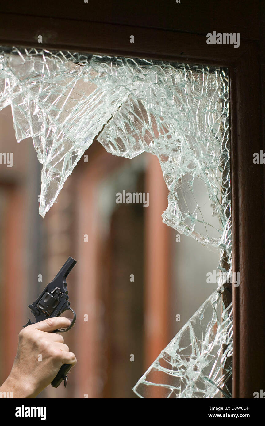 A house break in in Carlisle Cumbria UK and a hand gun Stock Photo - Alamy