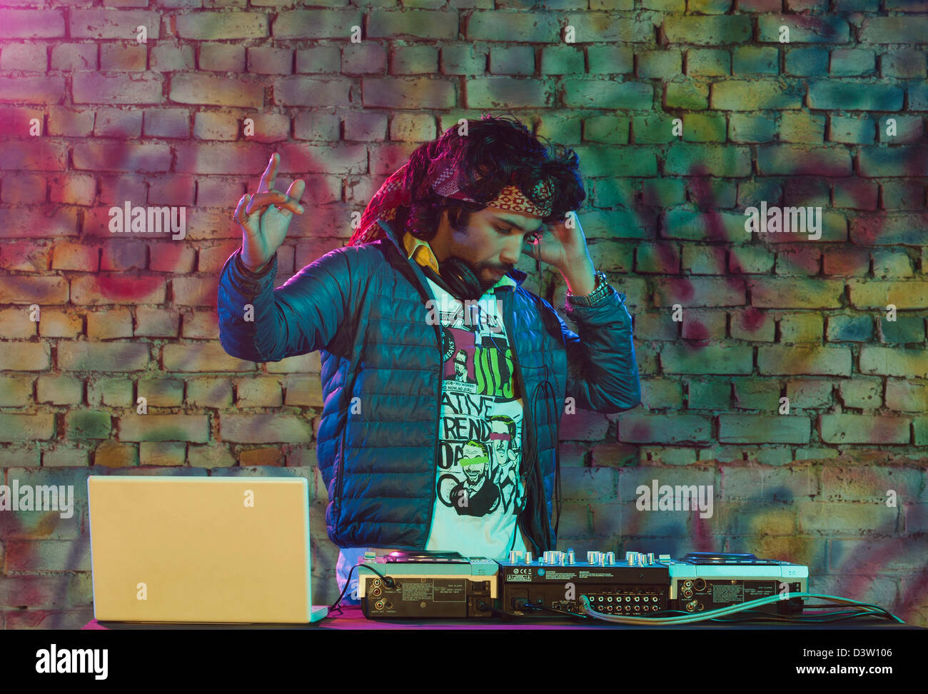 DJ playing music Stock Photo - Alamy