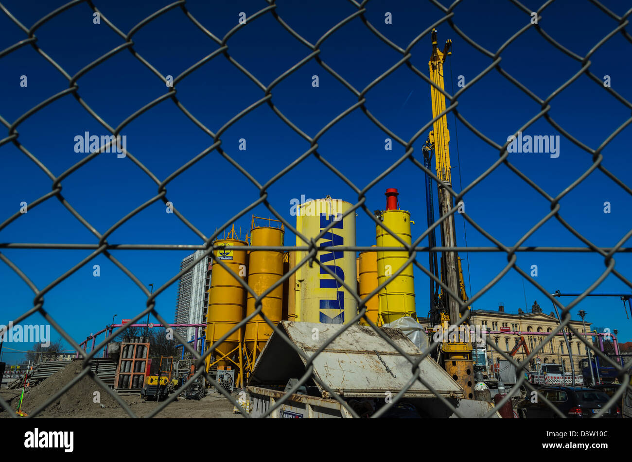 Yellow containers at road construction site Stock Photo - Alamy