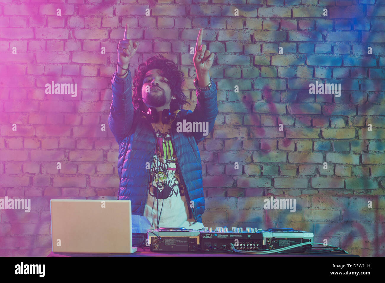 DJ playing music Stock Photo - Alamy