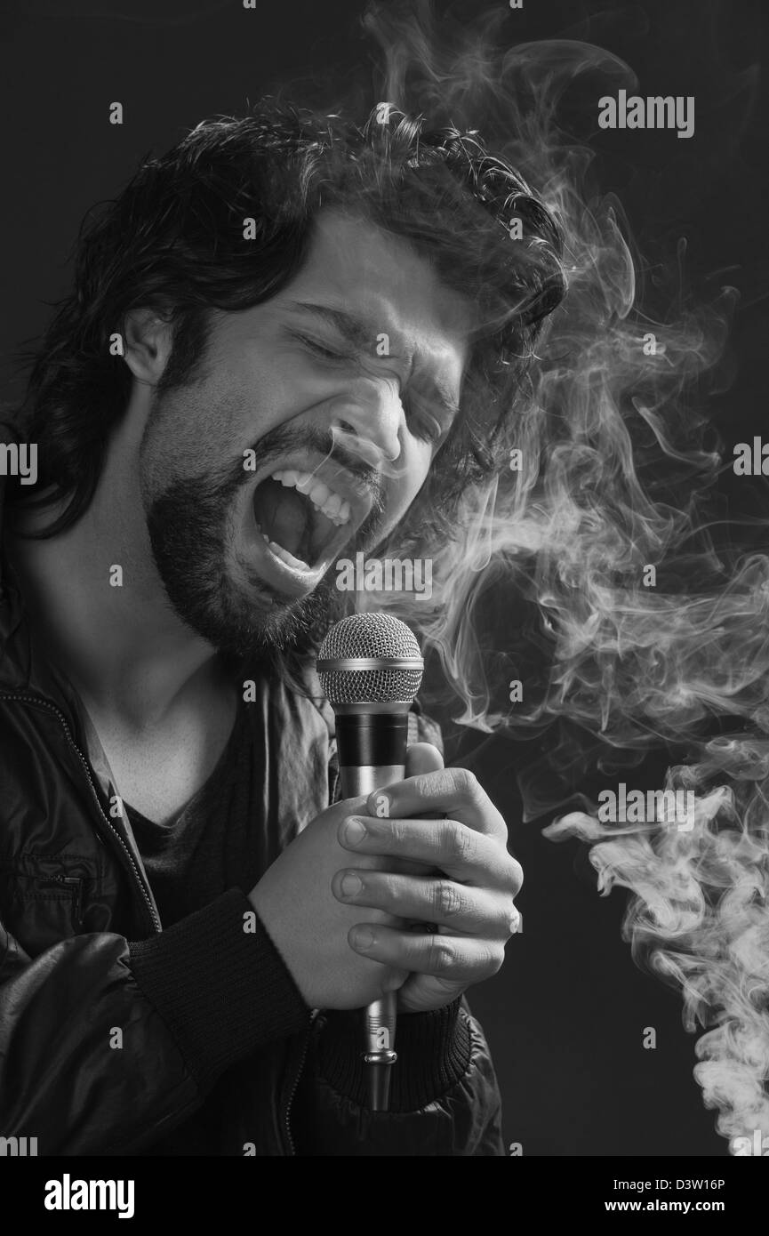 Singer microphone singing young Black and White Stock Photos & Images ...