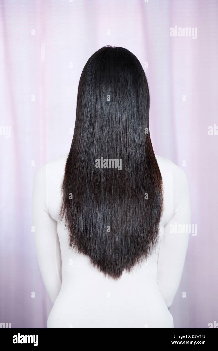 Rear view of a woman Stock Photo - Alamy