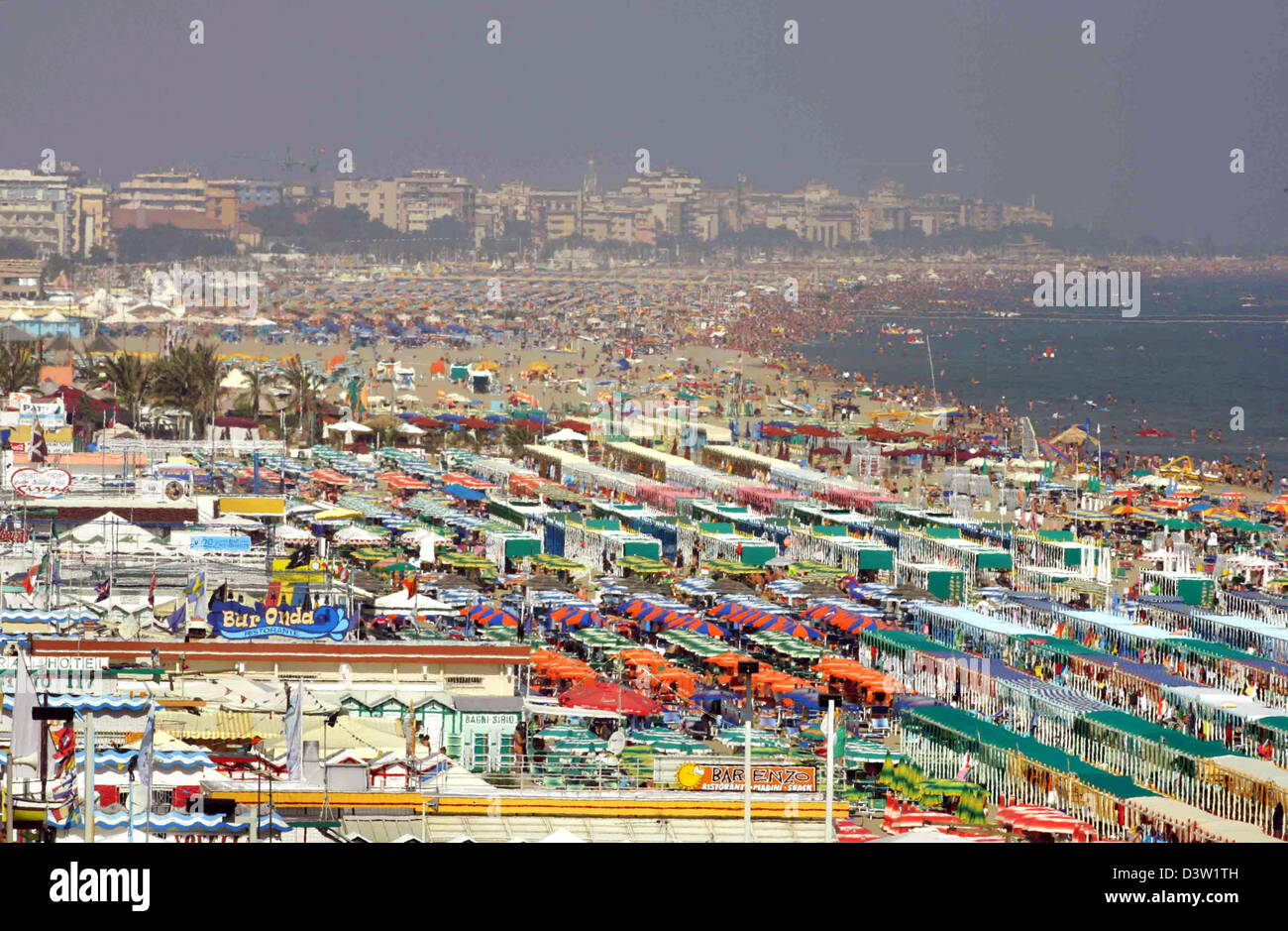 The picture shows the overcrowded beaches of Riccione and Rimini, Italy ...
