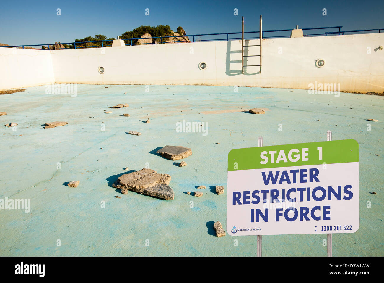 A derelict swimming pool at an abandoned holiday complex in Myrina on ...