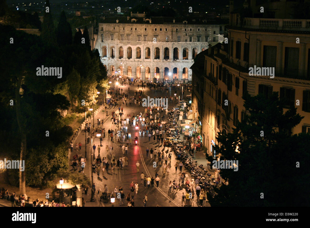 Crowds access the illuminated Marcello Theatre in Rome, Italy, 9 ...
