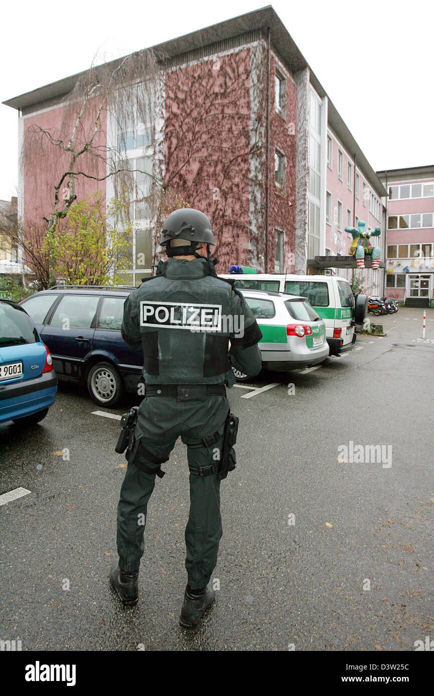 A special task force police officer is pictured in front of the ...